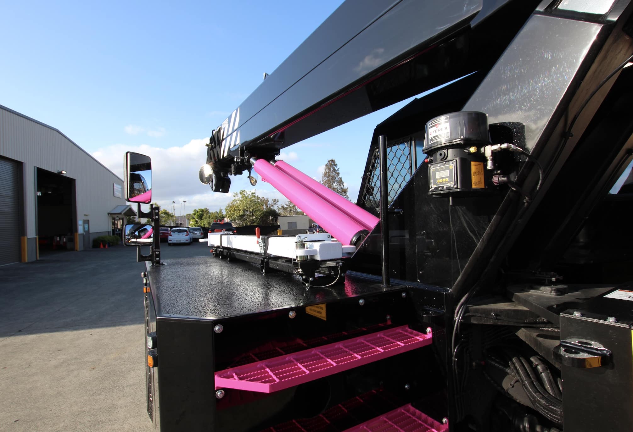 McPhan's' colour popping Franna - Cranes & Lifting